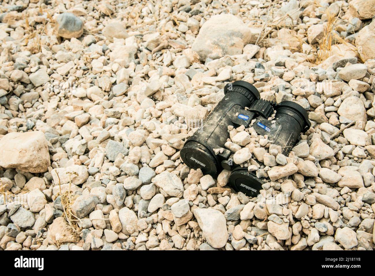 Rugged Snypex Binoculars against harsh background Stock Photo - Alamy