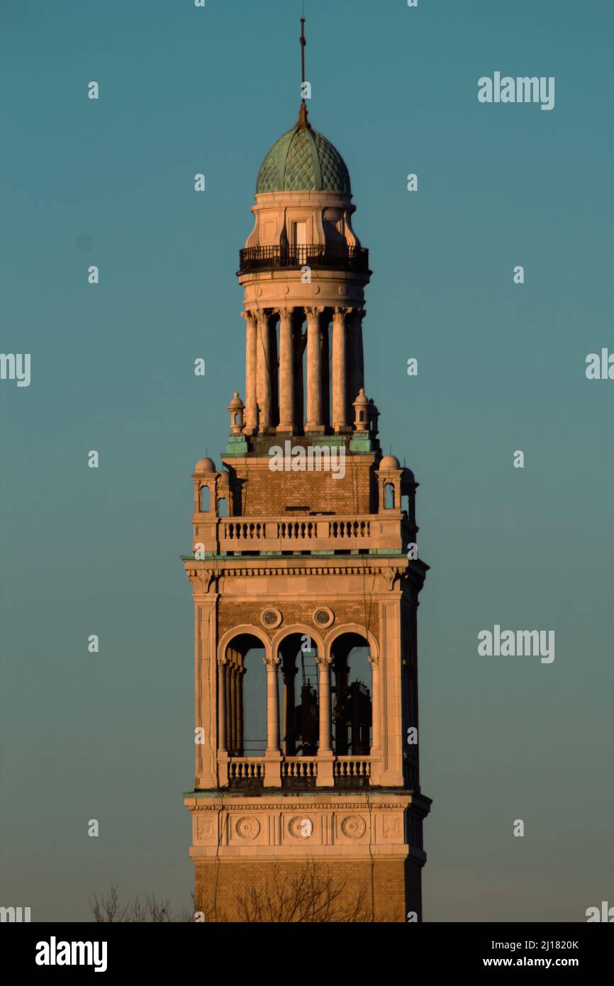 A vertical shot of ancient stone bell tower in the town Stock Photo - Alamy