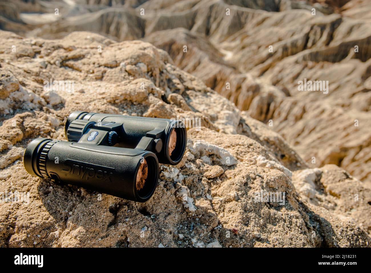 Rugged Snypex Binoculars against harsh background Stock Photo - Alamy