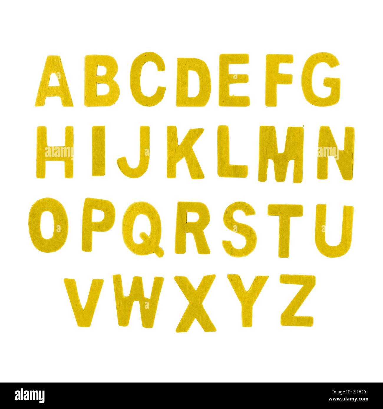 A wooden yellow alphabet letters isolated on white Stock Photo - Alamy