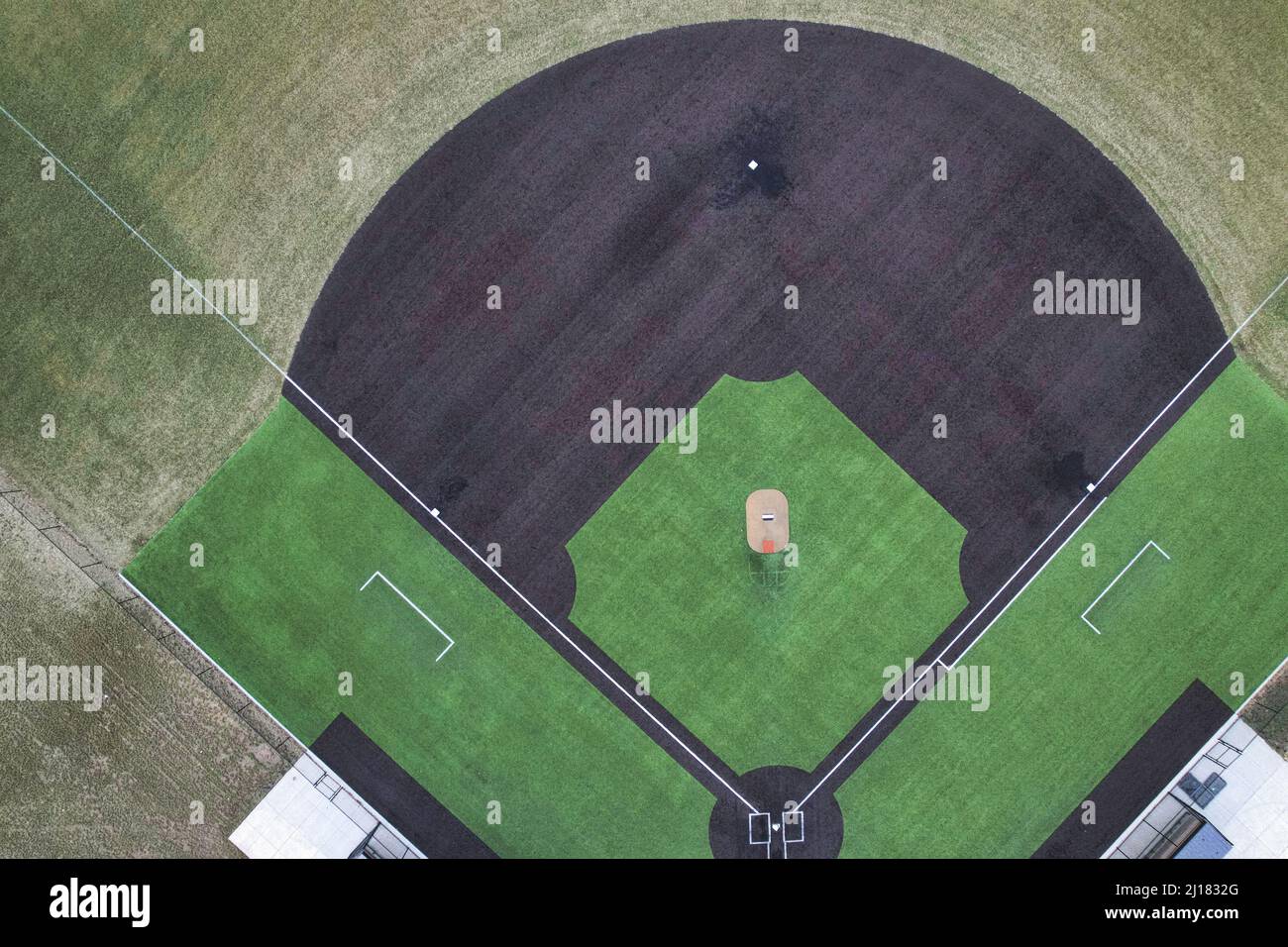 A pictured above a green and smooth playing field with borders drawn in ...