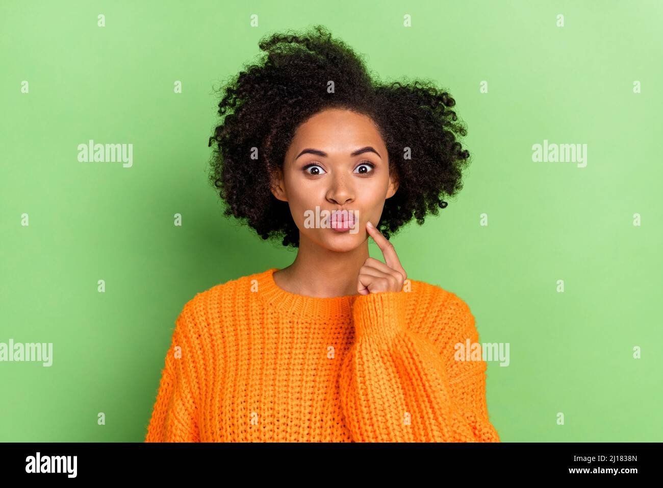 Photo Of Flirty Millennial Volume Hairdo Lady Blow Kiss Wear Orange