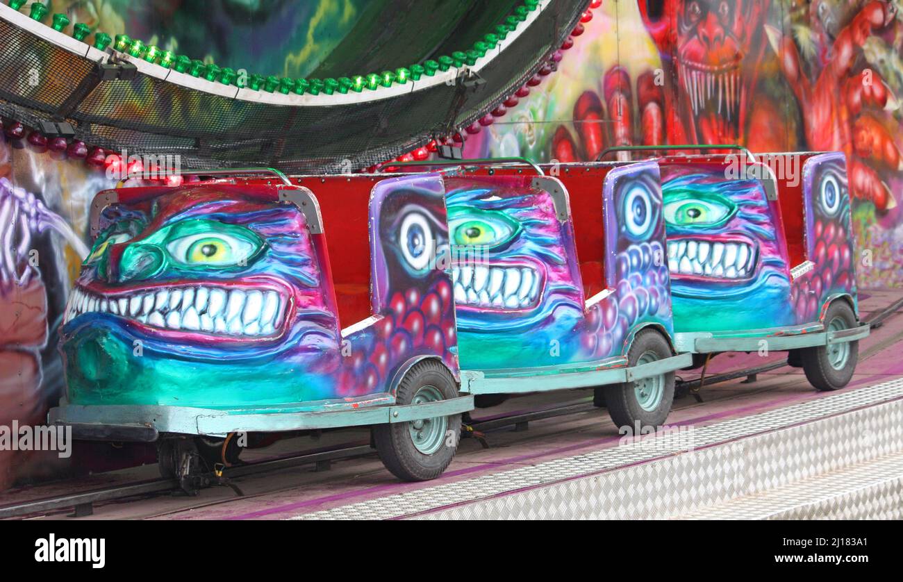 A Set of Carriages from a Scary Fun Fair Ride Stock Photo - Alamy