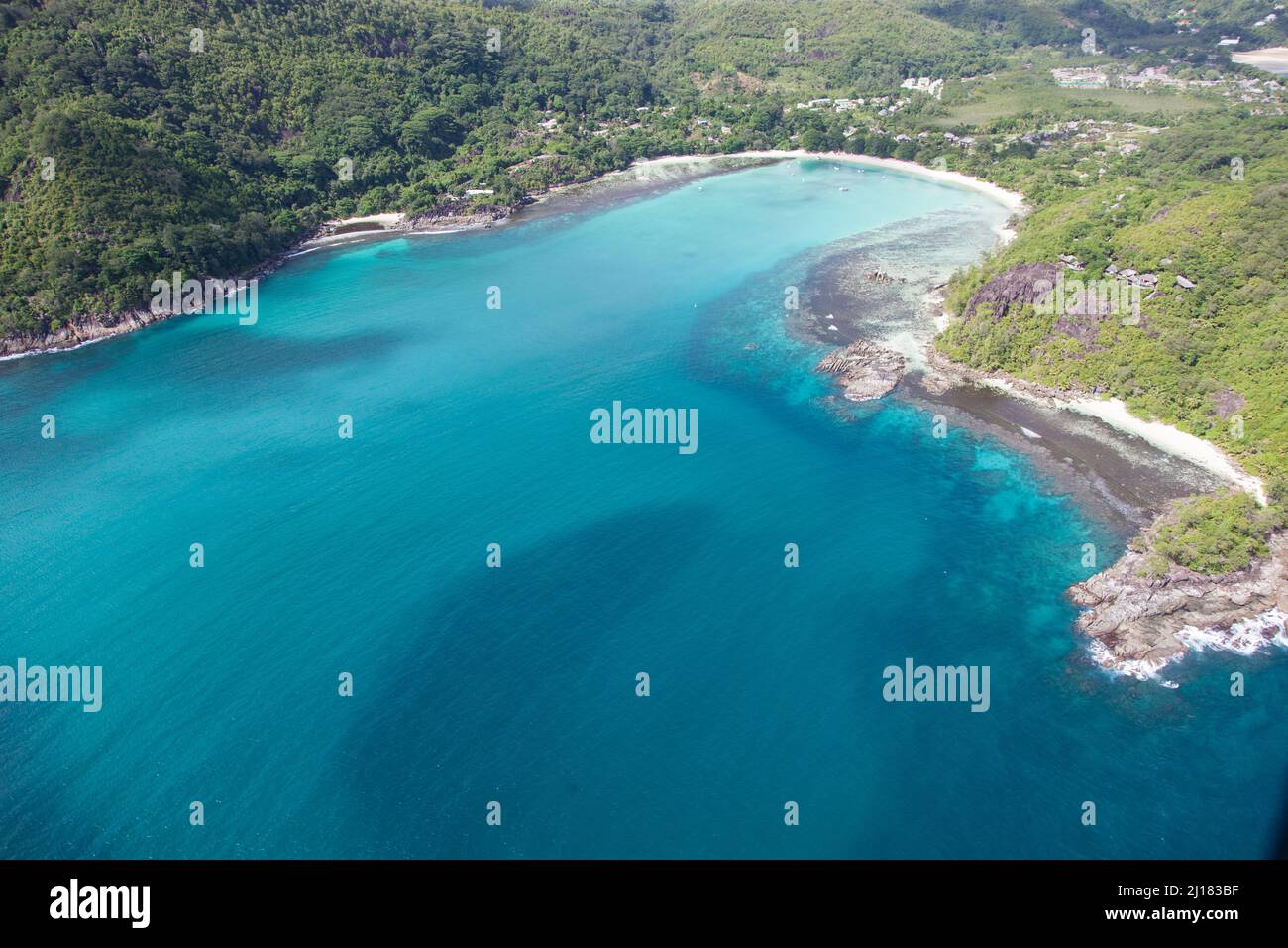 Aerial view of bay with white sand beach in Seychelles, Mahe Island ...