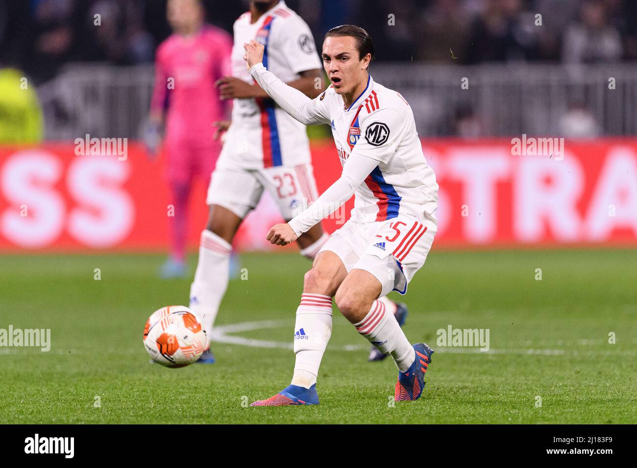 LYON, FRANCE - MARCH 17: Maxence Caqueret of Lyon looks to pass the ...