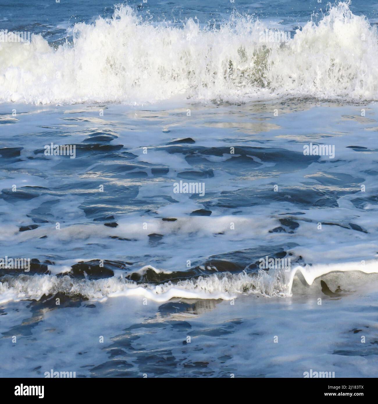 Tidal waters at Penbryn Wales Stock Photo - Alamy