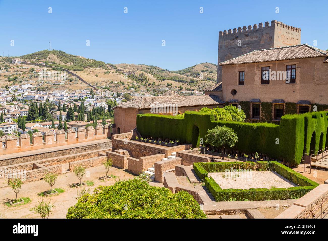 GRANADA, SPAIN - August 16, 2021: The ancient walls of the Alcazaba ...