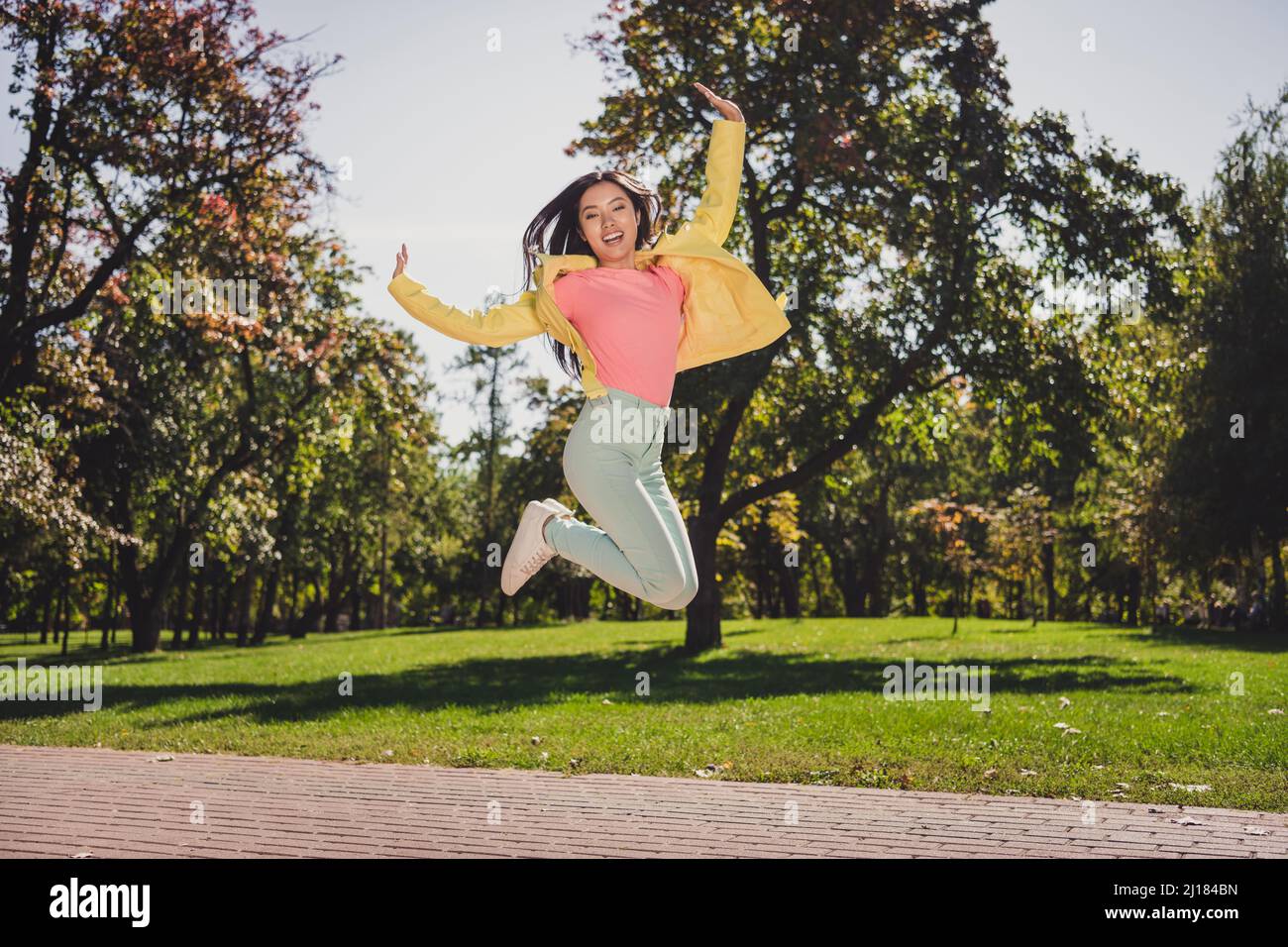 Full length body size view of attractive ecstatic cheerful girl jumping ...