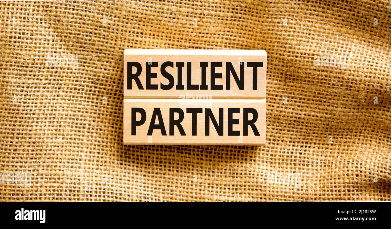Resilient partner symbol. Concept words Resilient partner on wooden ...
