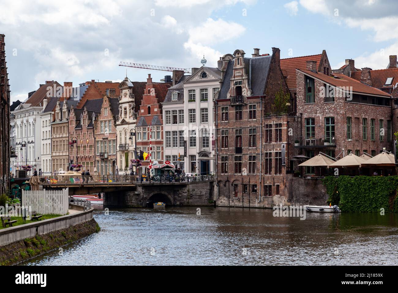 The historical Flemish houses on the water canals of Ghent, Belgium ...