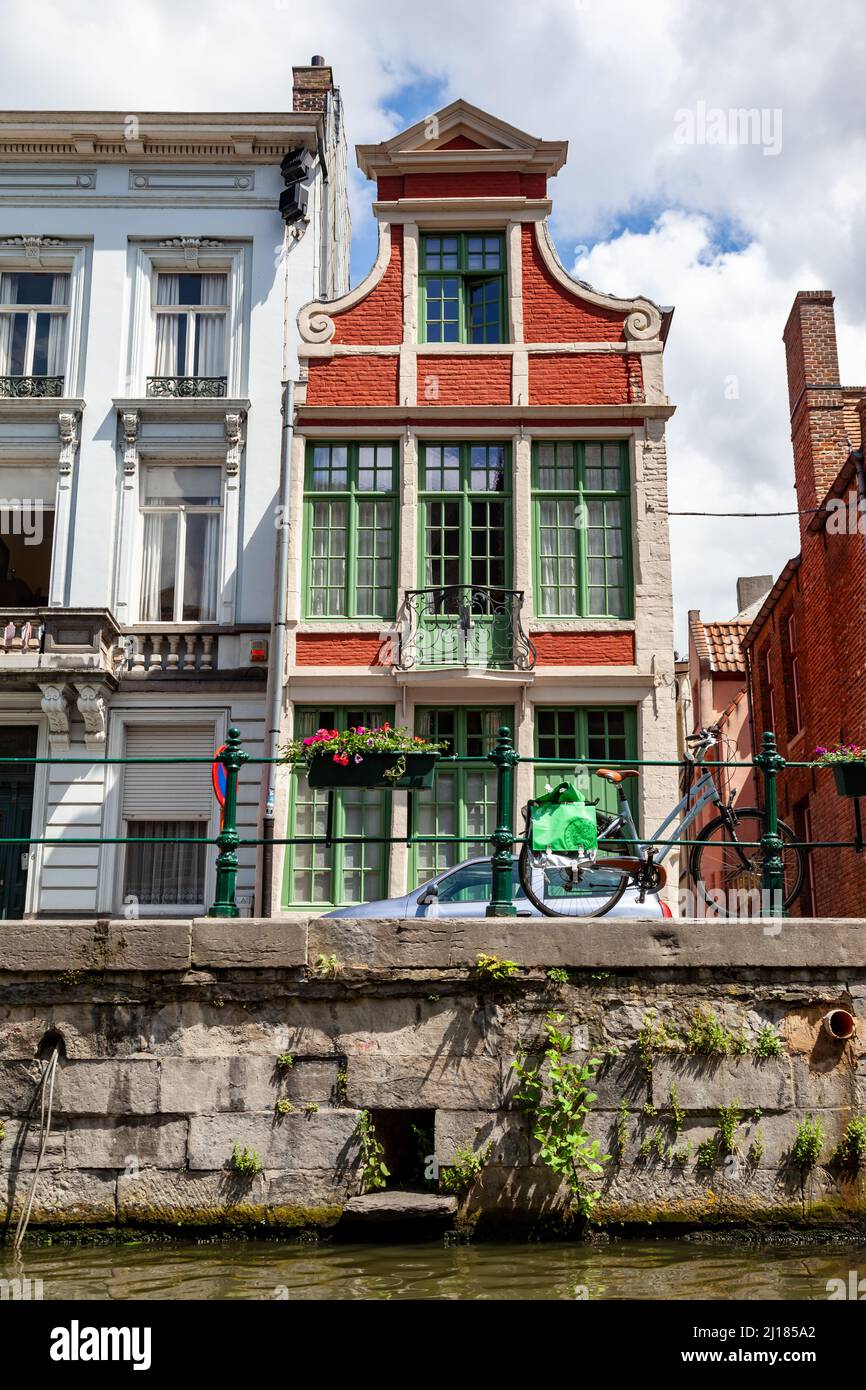 The historical Flemish houses on the water canals of Ghent, Belgium ...