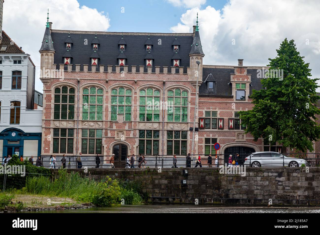 The historical Flemish houses on the water canals of Ghent, Belgium ...