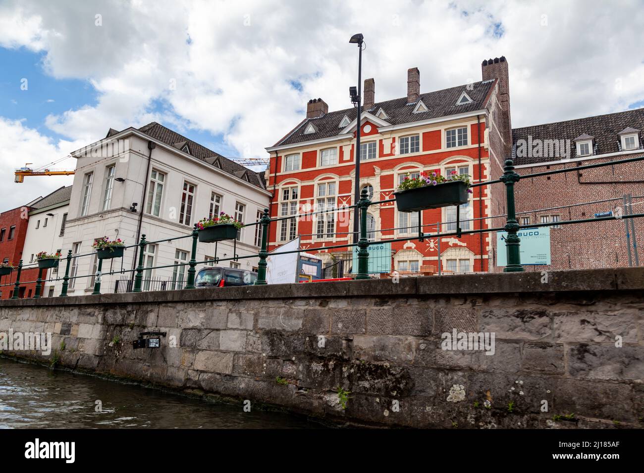 The historical Flemish houses on the water canals of Ghent, Belgium ...
