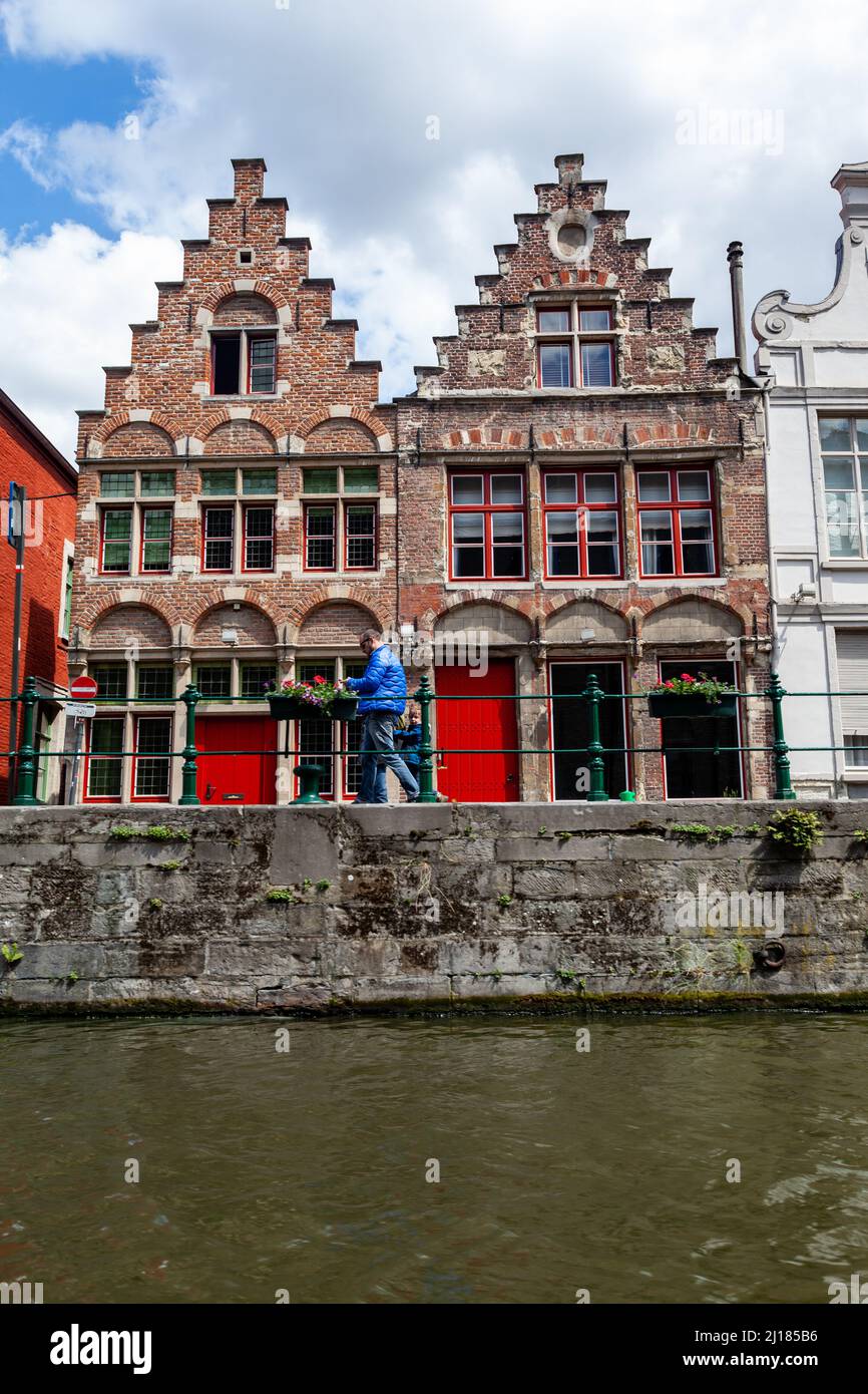 The historical Flemish houses on the water canals of Ghent, Belgium ...