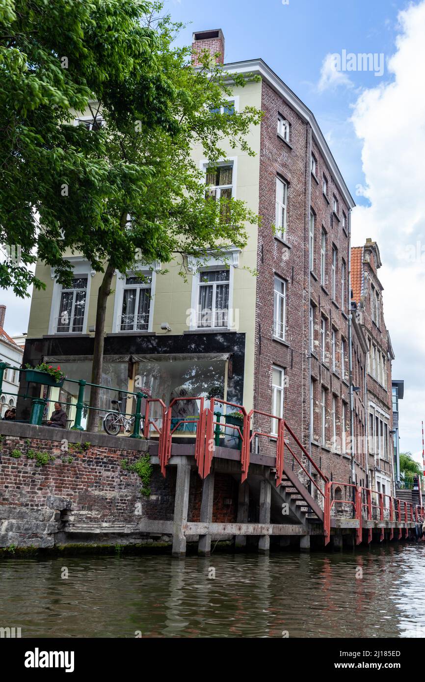 The historical Flemish houses on the water canals of Ghent, Belgium ...