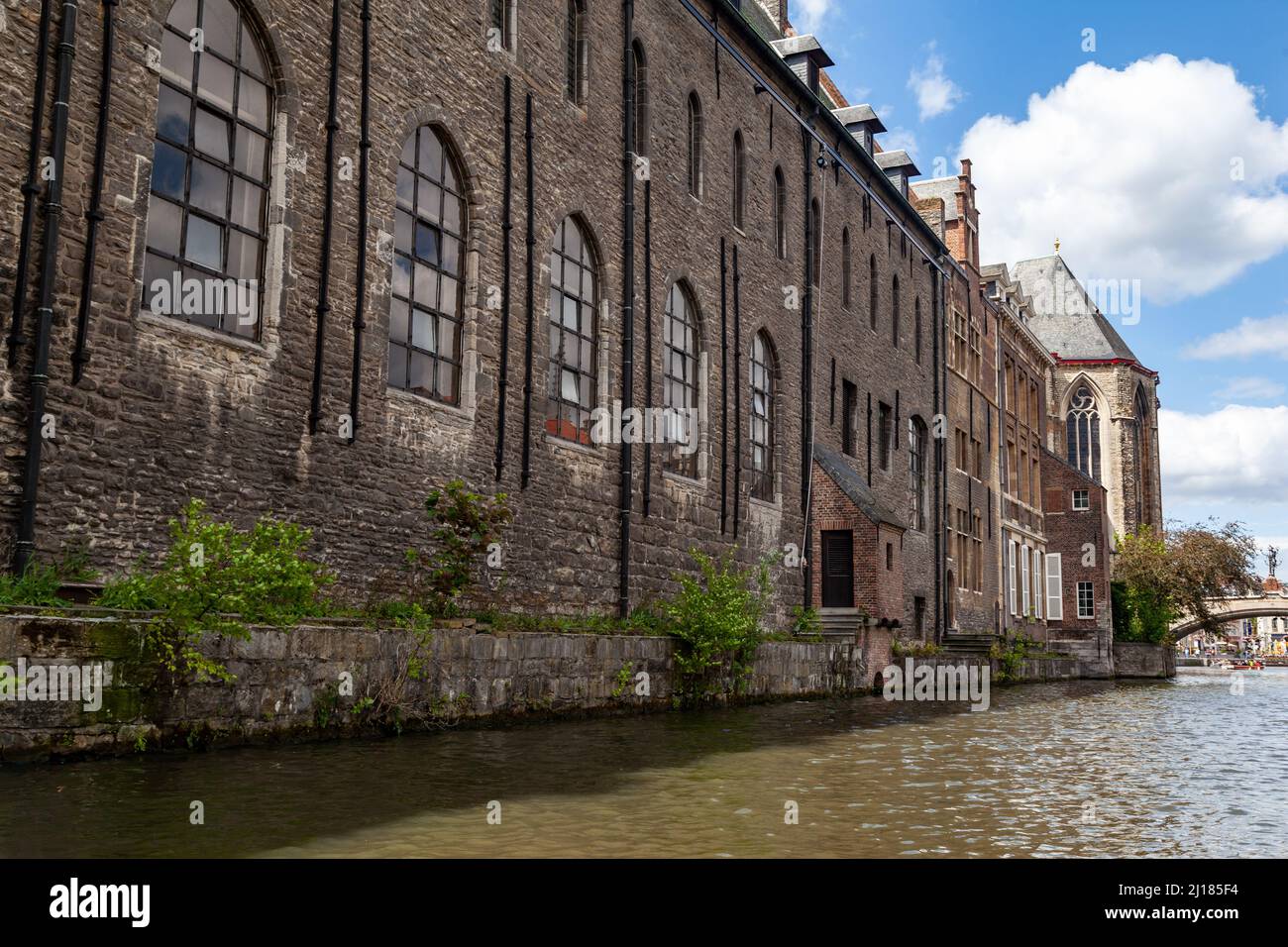 The historical factory on the water canals of Ghent, Belgium Stock ...