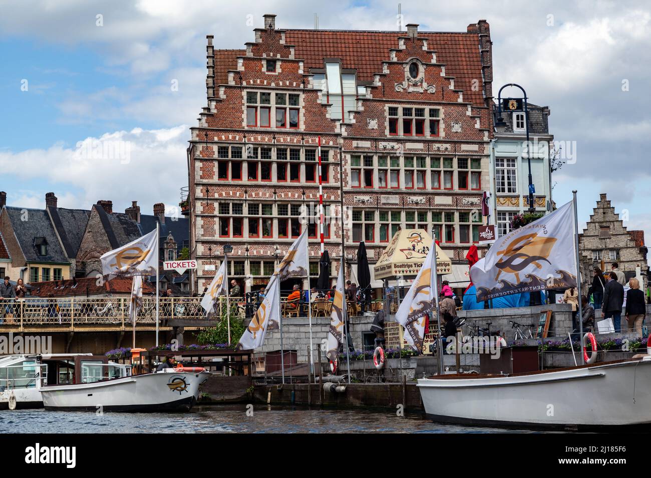 The historical Flemish houses on the water canals of Ghent, Belgium ...