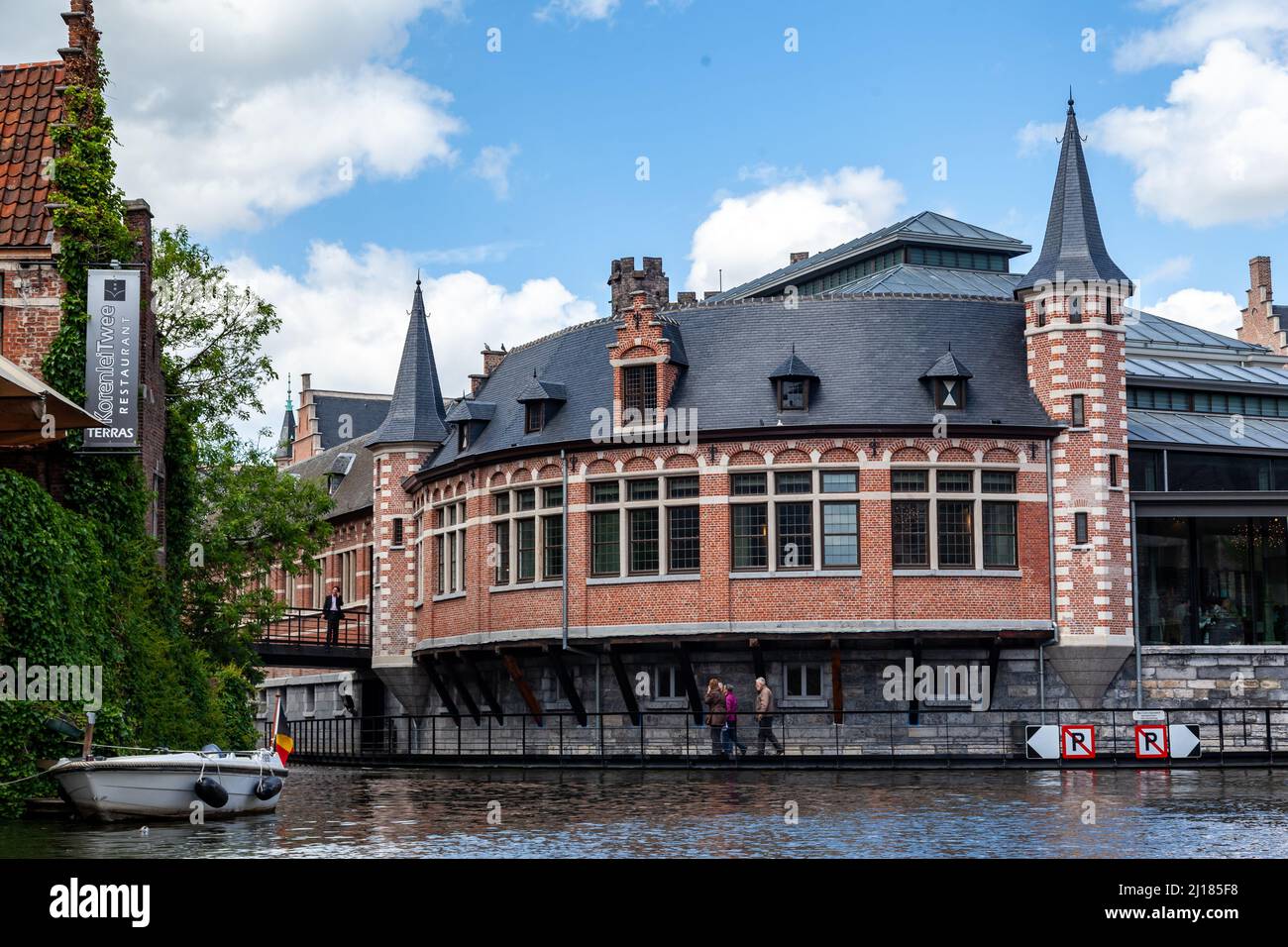 The historical flemish houses on the water canals of Ghent, Belgium ...