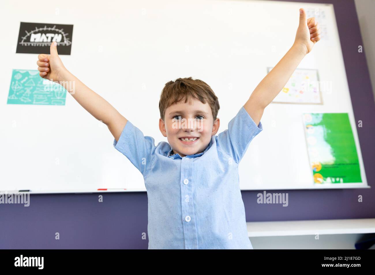 Arms raised classroom hi-res stock photography and images - Alamy