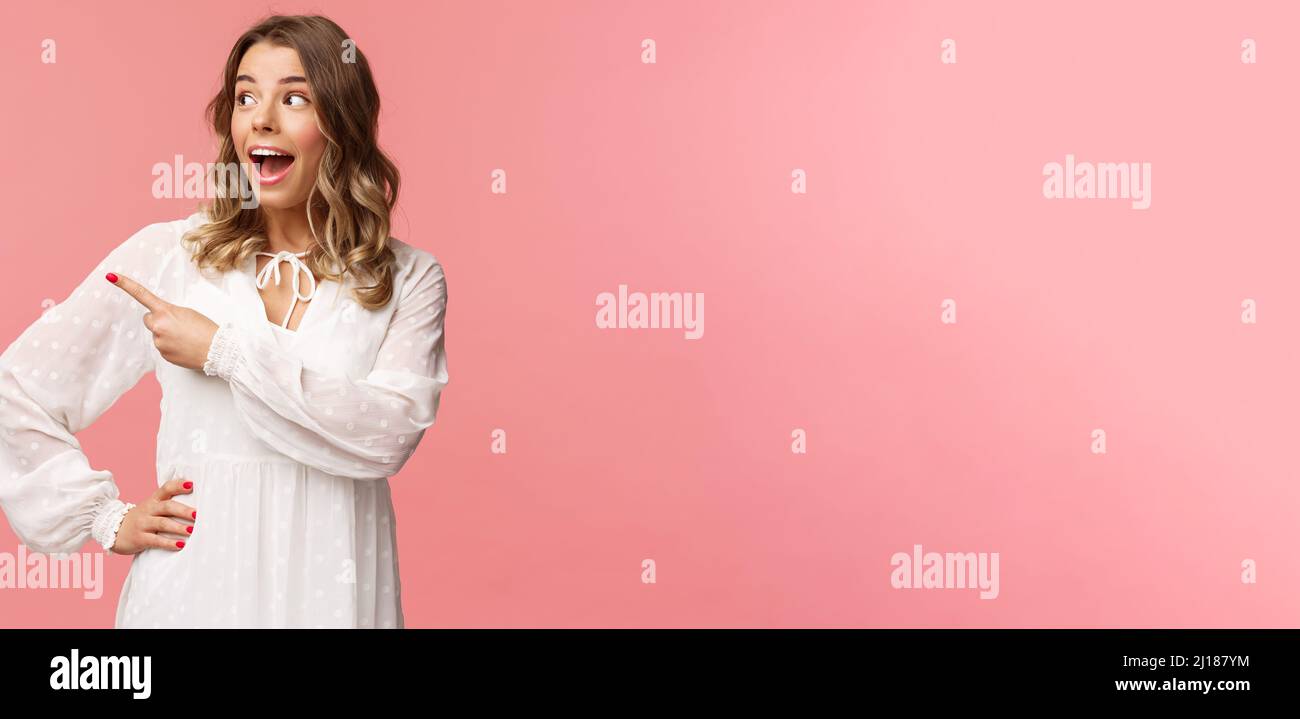 Excited and amazed blond caucasian girl in kawaii dress, open mouth ...