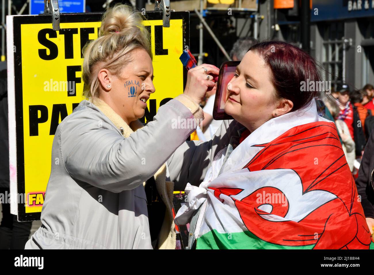 Cardiff, Wales - March 2022: Welsh rugby fan having a stencilled face ...