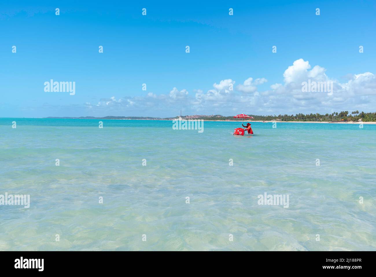 Maragogi, AL, Brazil - October 17, 2021: popsicle seller pushing his ...
