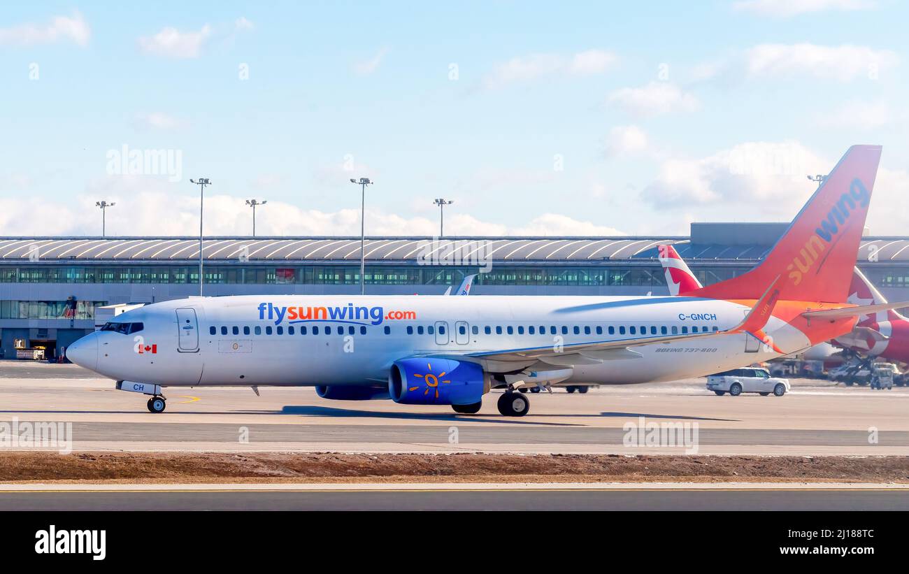 A Sunwing branded airplane is seen in the tarmac of Pearson ...