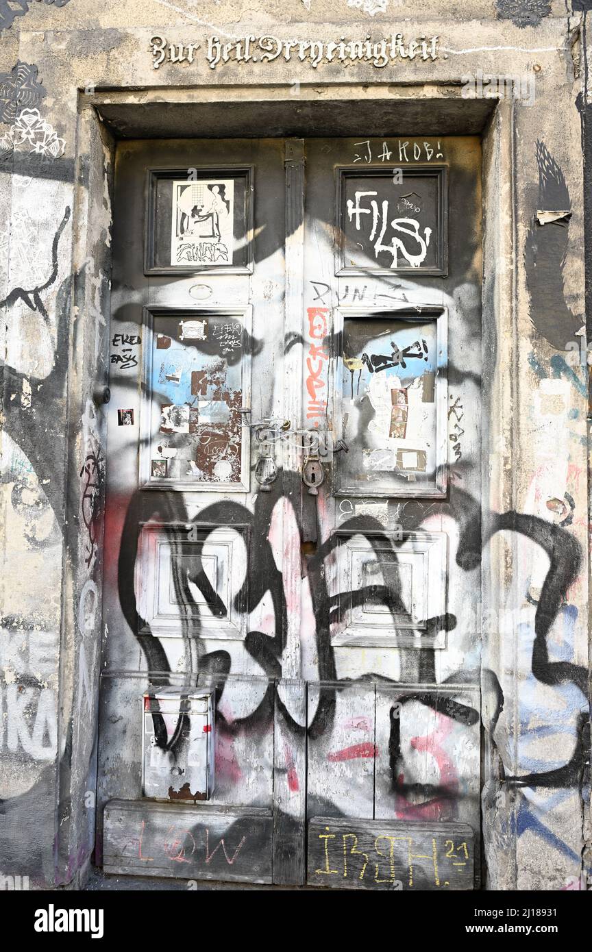 Vienna, Austria. Old wooden door with the inscription "To the Holy ...