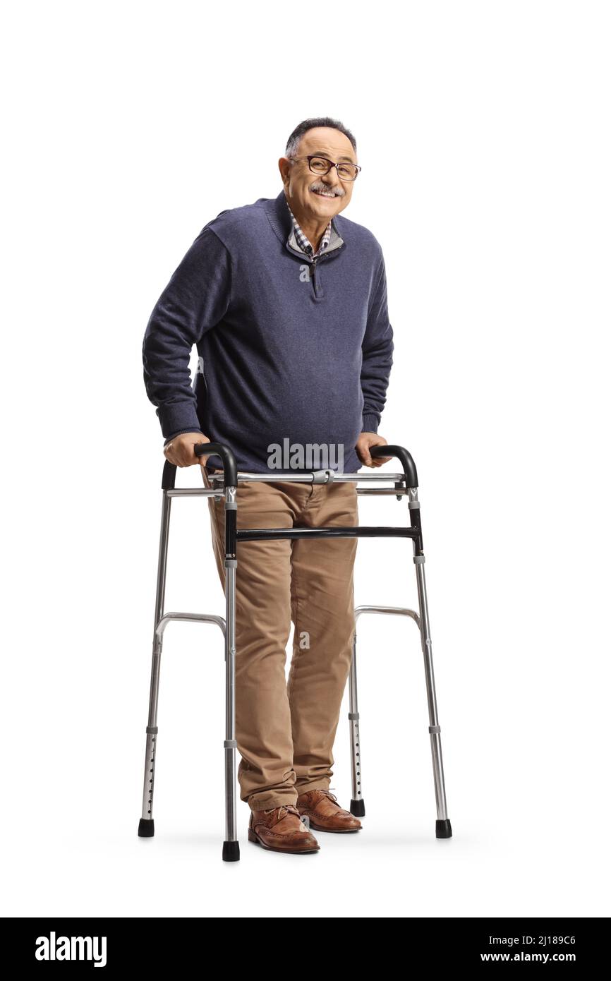 Full length portrait of a mature man standing with a walker isolated on ...