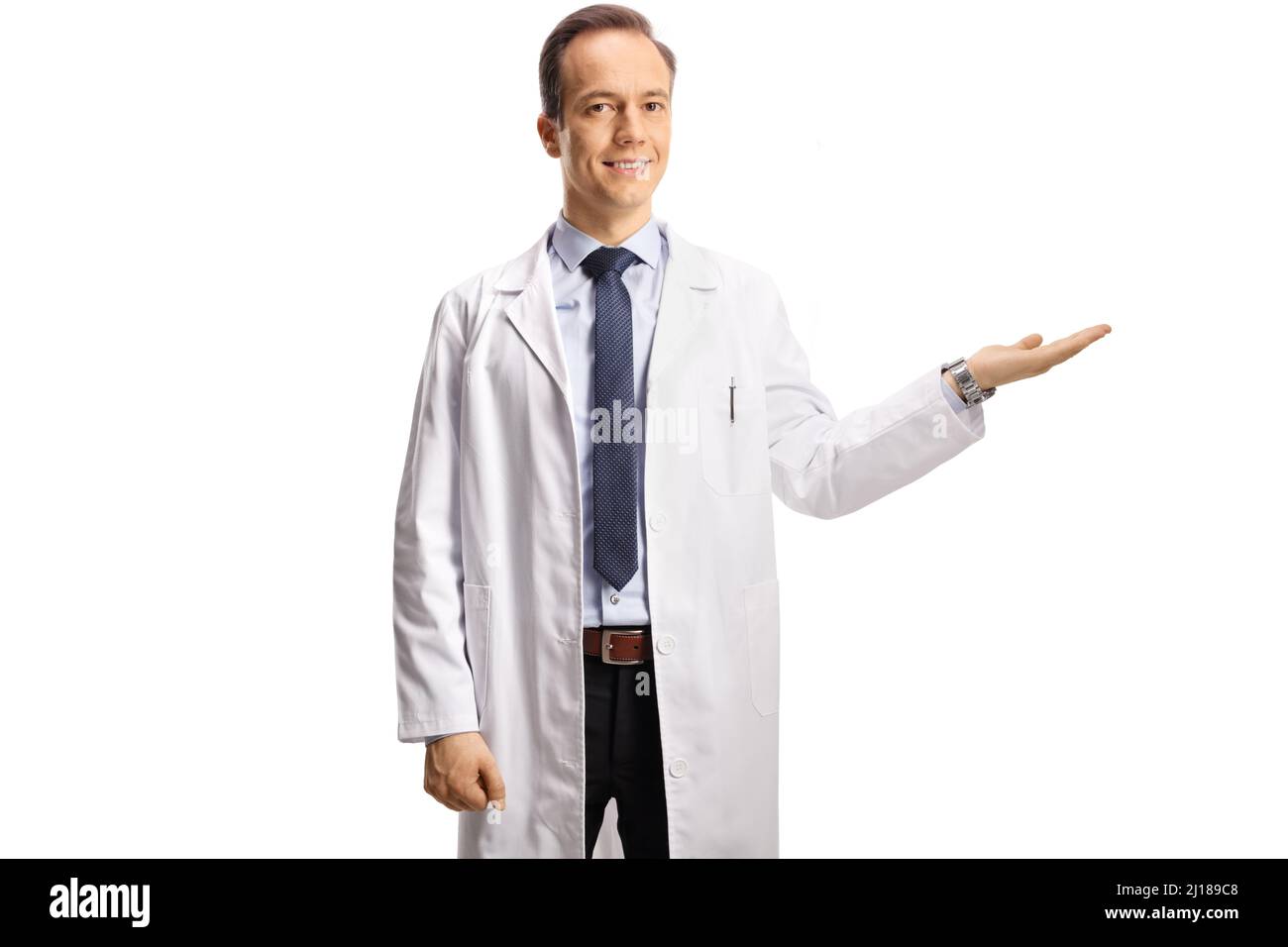 Male doctor showing with his hand and looking at camera isolated on ...