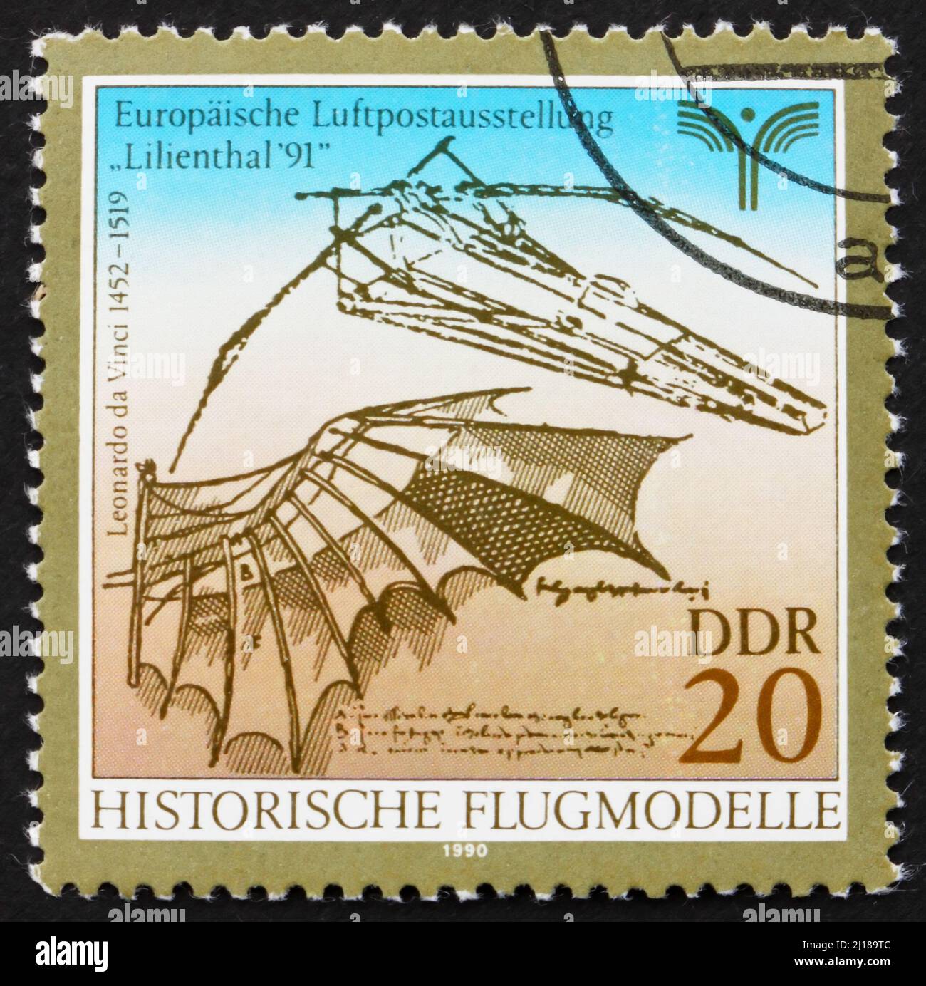 GDR - CIRCA 1990: a stamp printed in GDR shows Flying Machine Designed ...
