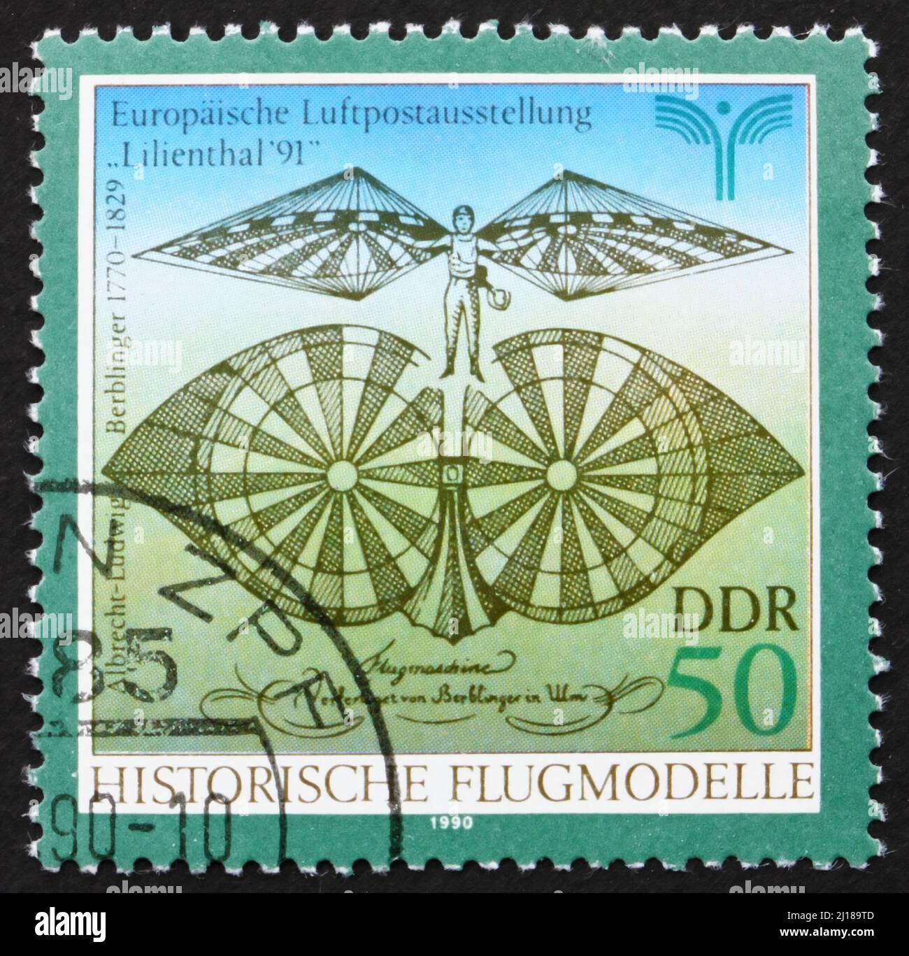 GDR - CIRCA 1990: a stamp printed in GDR shows Flying Machine Designed ...