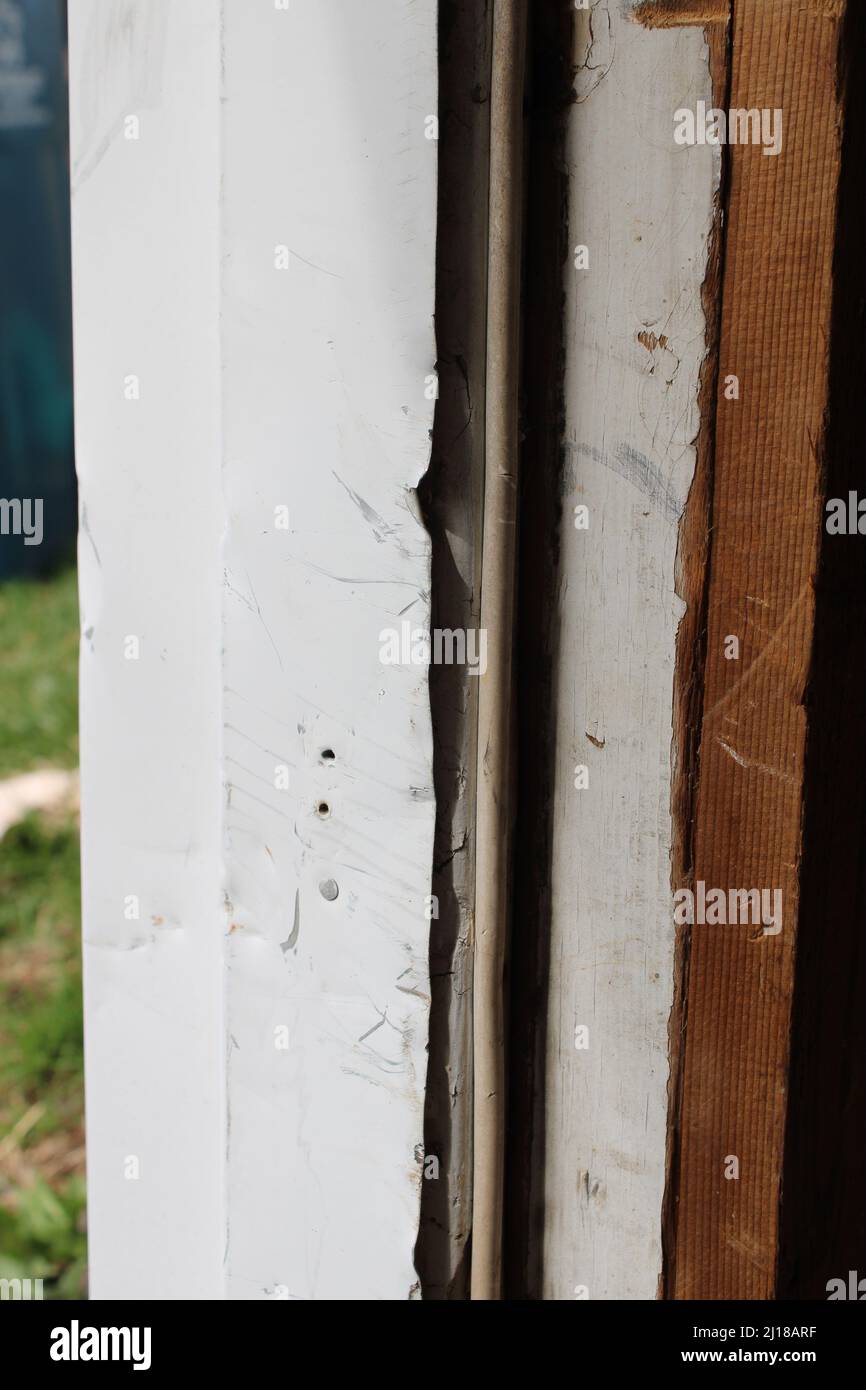 A Dent in a White Metal Door Trim Stock Photo - Alamy