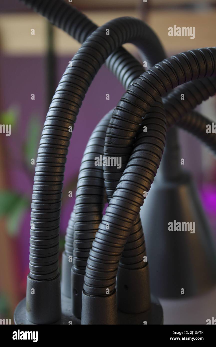 Five Thick Metal Cables Intertwined Stock Photo - Alamy