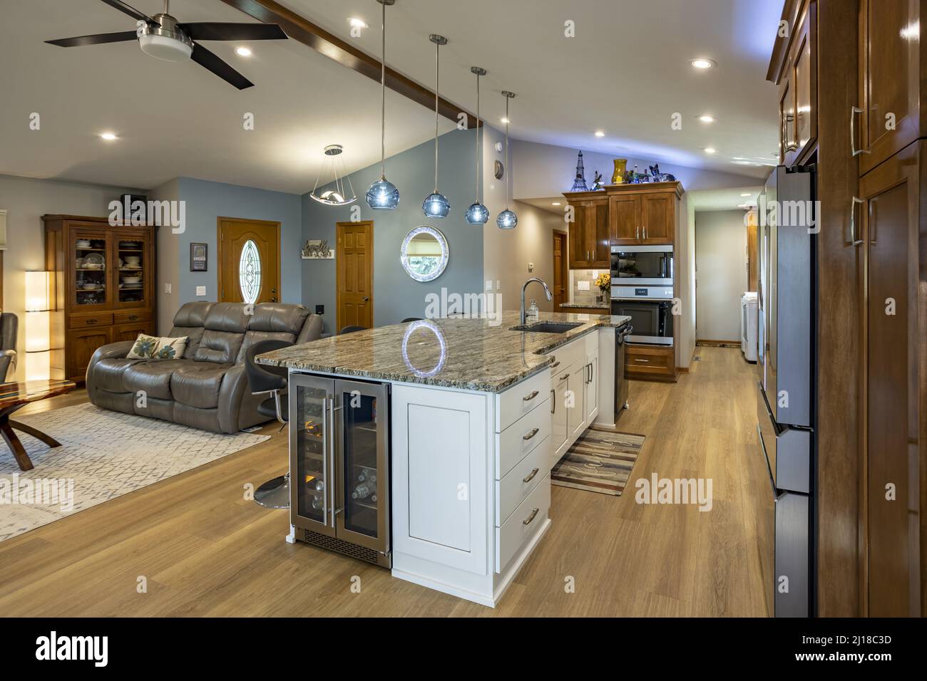 A cozy open floor plan home with wooden floor Stock Photo - Alamy