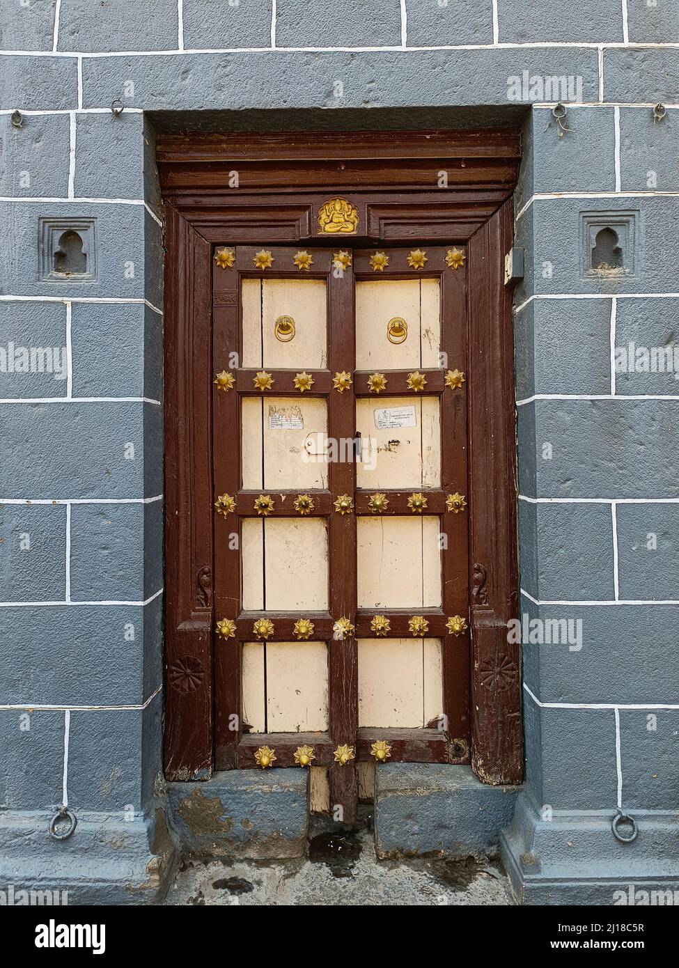 21 March 2022, Pandharpur, India, Old Vintage wooden door on retro wall ...