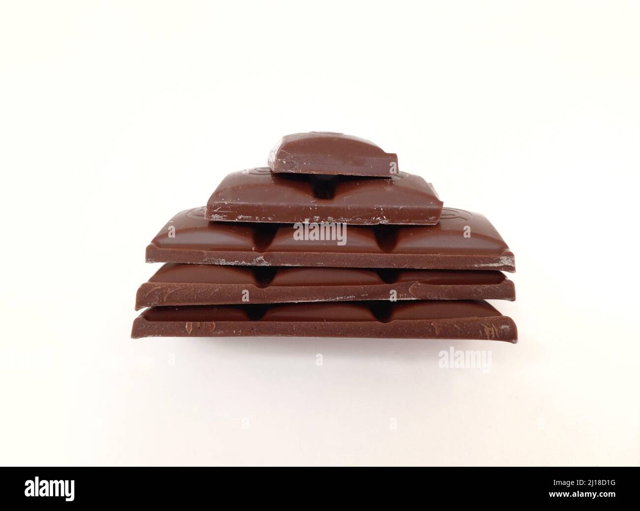 Dark chocolate bar texture isolated on white background from back view ...