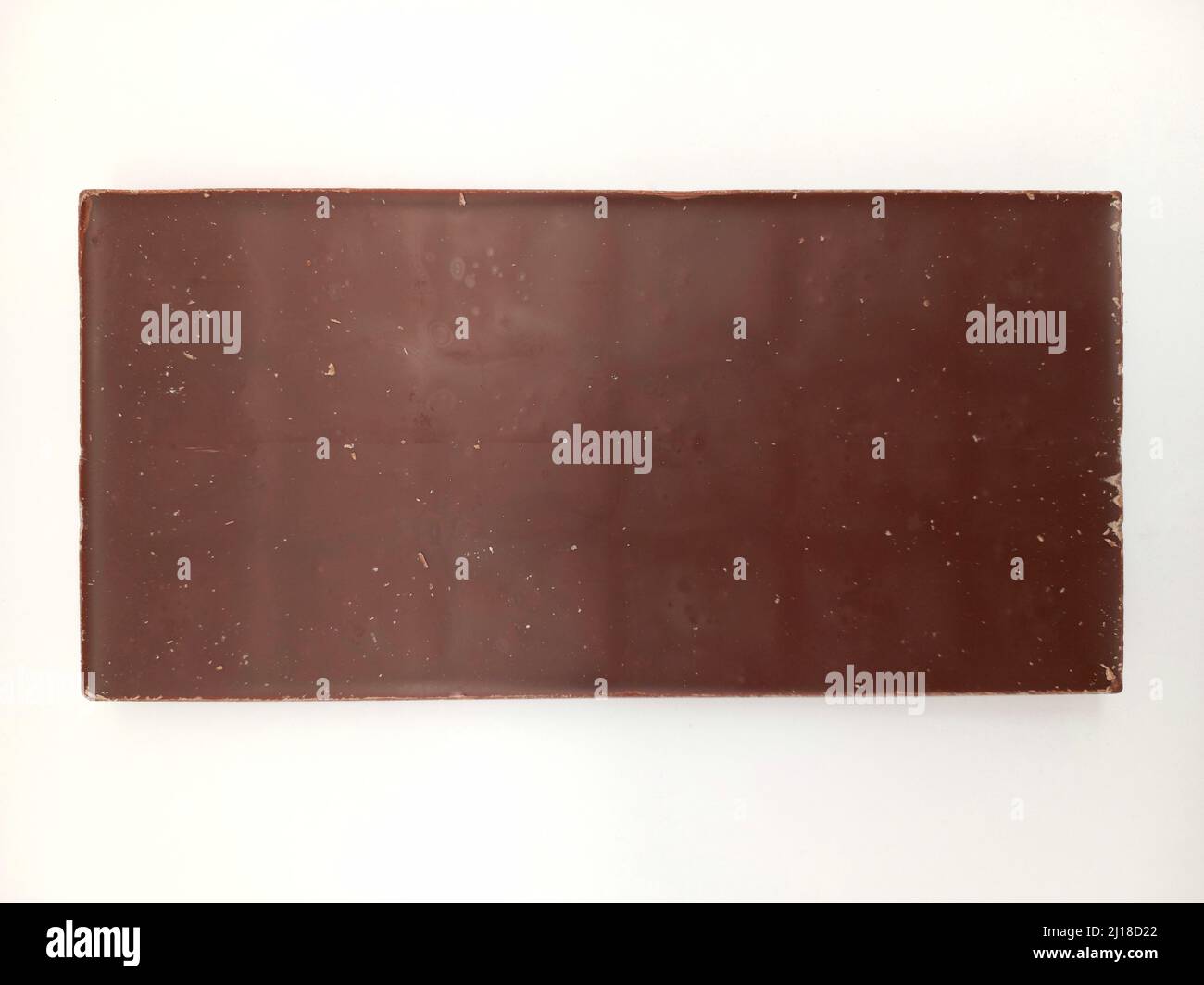 Dark chocolate bar texture isolated on white background from back view ...