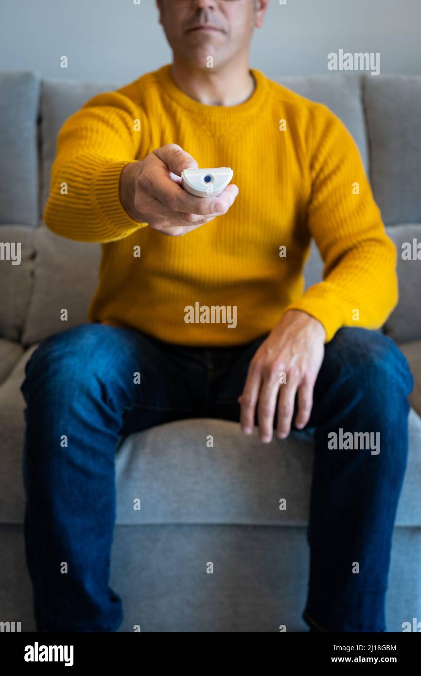 Remote control man pointing hi-res stock photography and images - Alamy