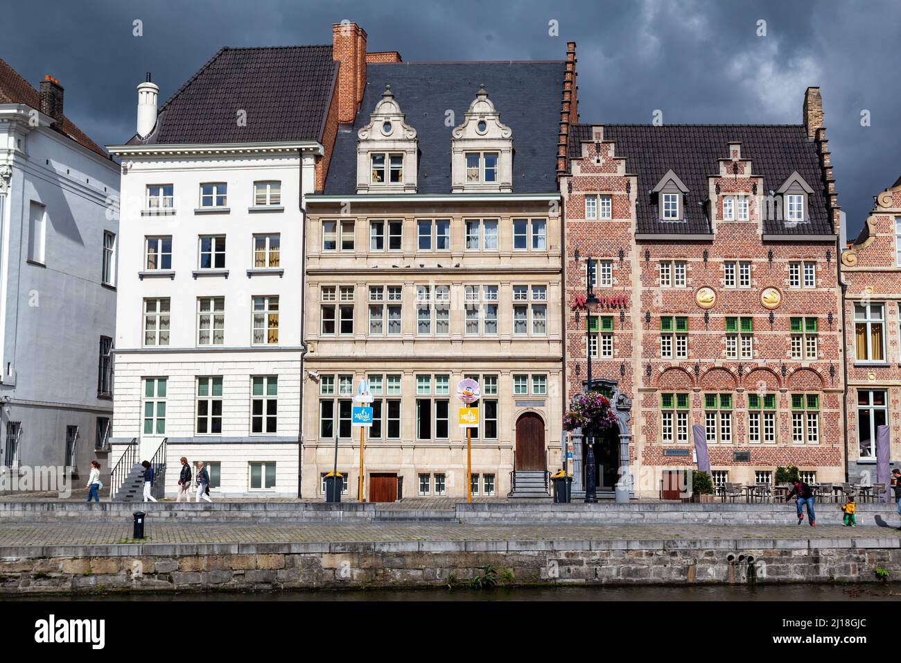 A the facade of the historical flemish houses on the water canals of ...