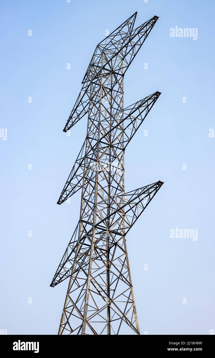 Close up shot of under construction high voltage electricity tower ...
