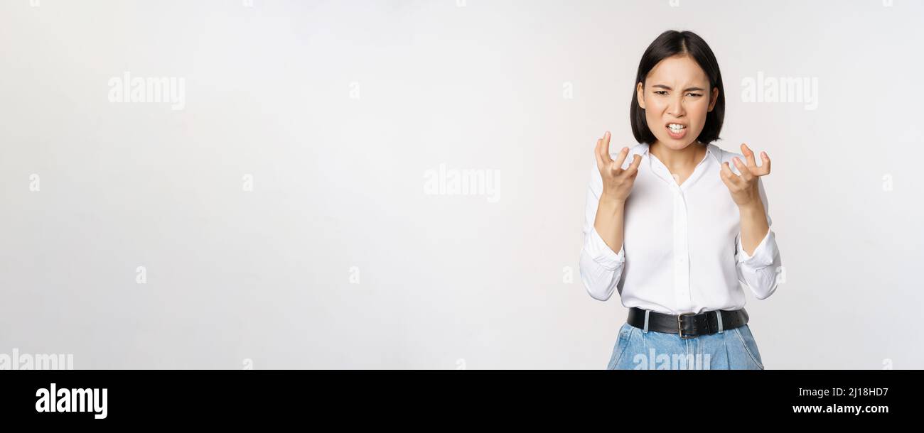 Image of angry pissed off woman shaking from anger, clench hands and ...
