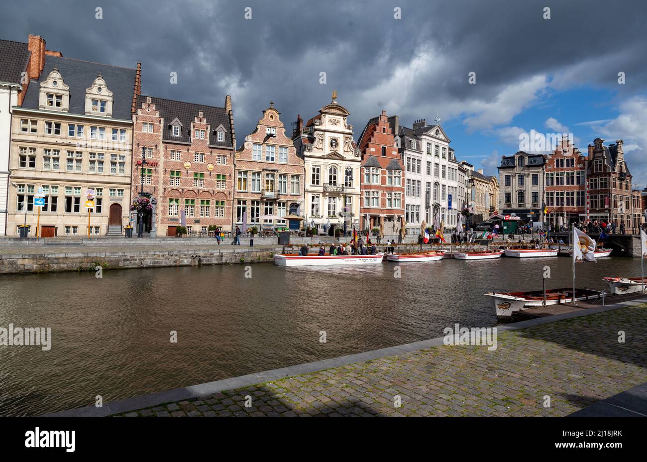 A the facade of the historical flemish houses on the water canals of ...