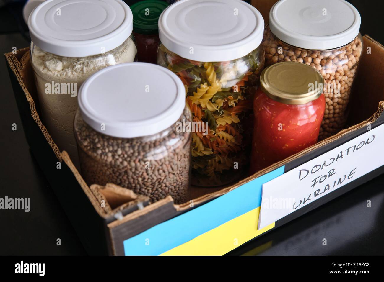 A Cardboard box with food to donate to the Ukrainian refugees Stock ...