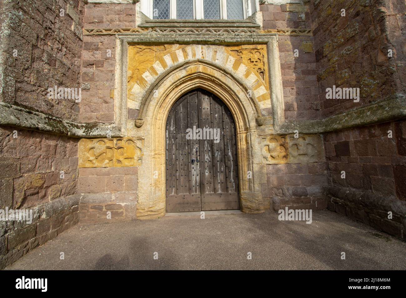 CULLOMPTON, DEVON, UK - SEPTEMBER 16, 2021 front door and base of the ...