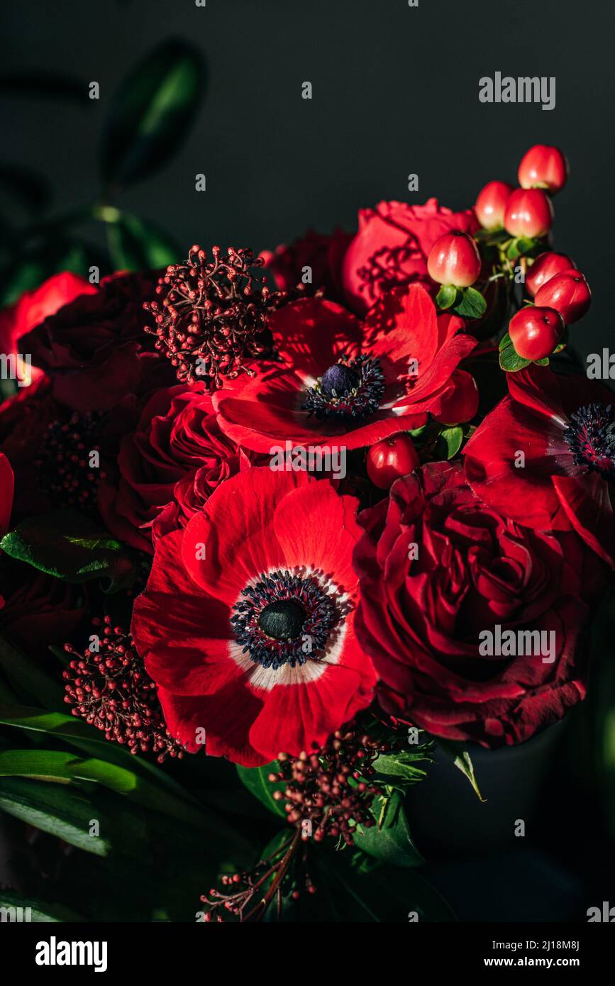 Bright red flowers bouquet Stock Photo - Alamy
