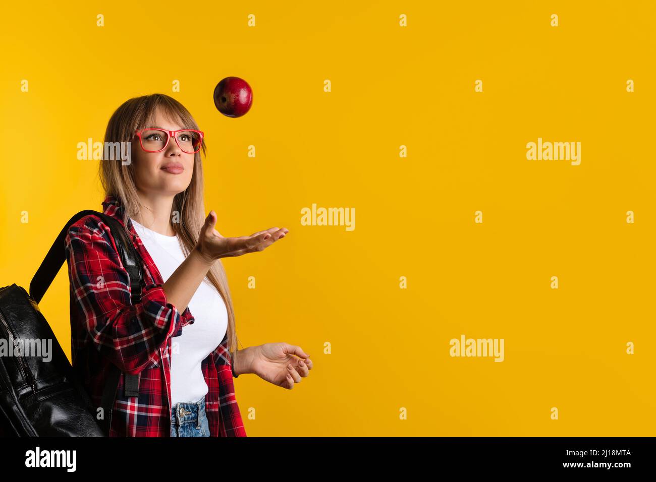 Girl student wears casual clothes and red eyewear. Smart Young woman ...