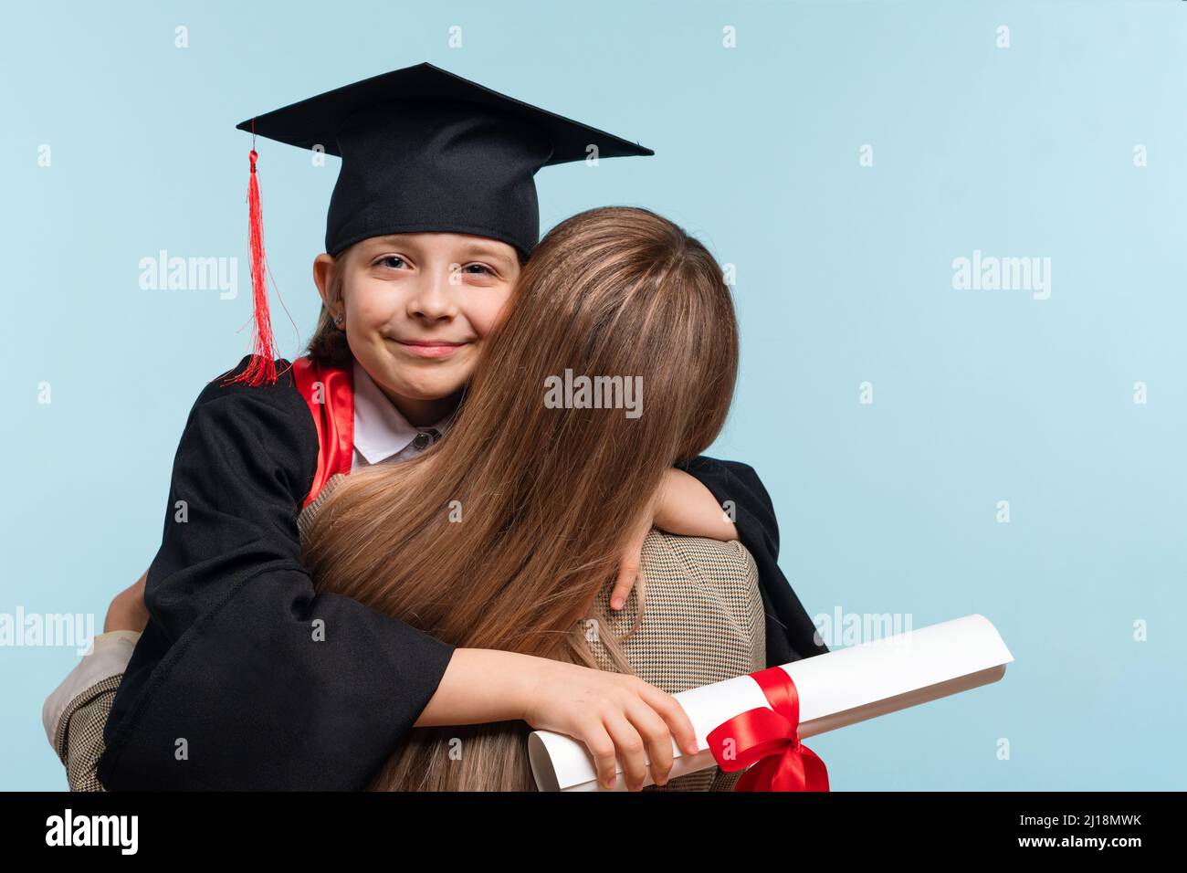 Little girl graduate celebrating graduation. Child wearing graduation ...