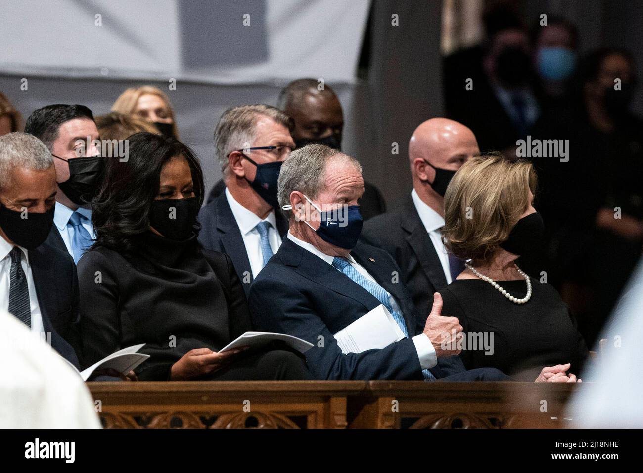 Former U.S. President George W. Bush, gives a thumbs up to Madeleine ...
