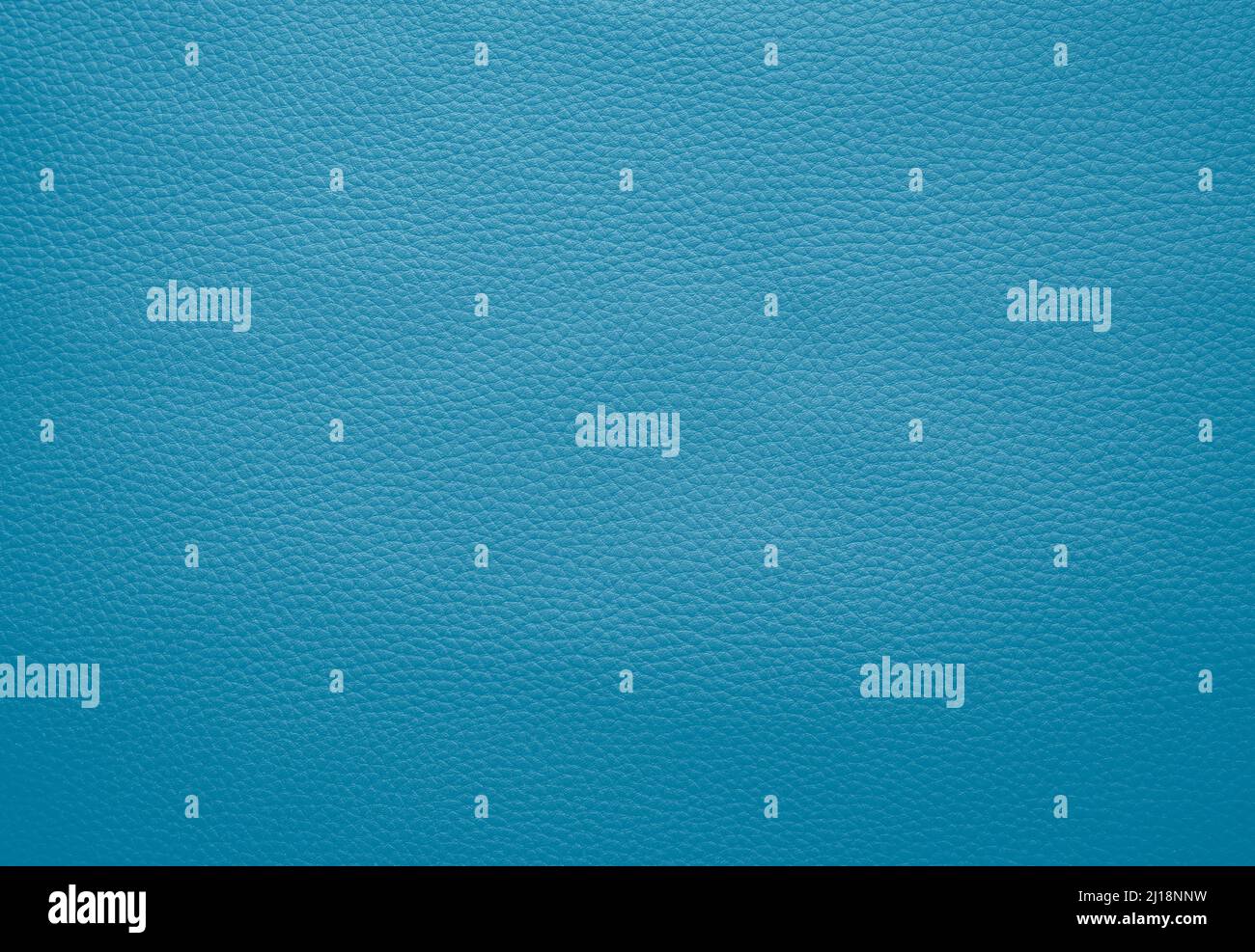 Close-up of detailed turquoise or light blue faux leather surface. High ...